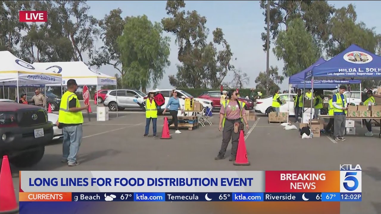 Lines build at food distribution site as historic government shutdown ...