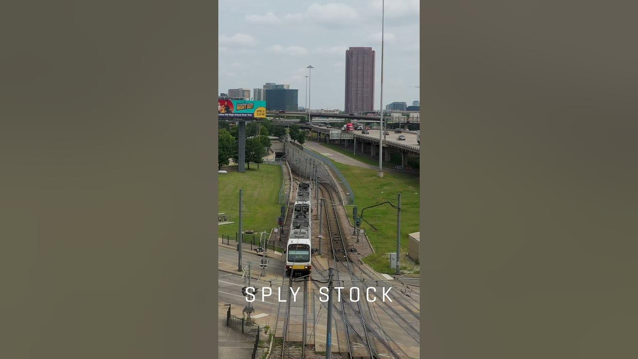 DART Train next to US75 South in Dallas Texas 4K Aerial Stock Footage - YouTube