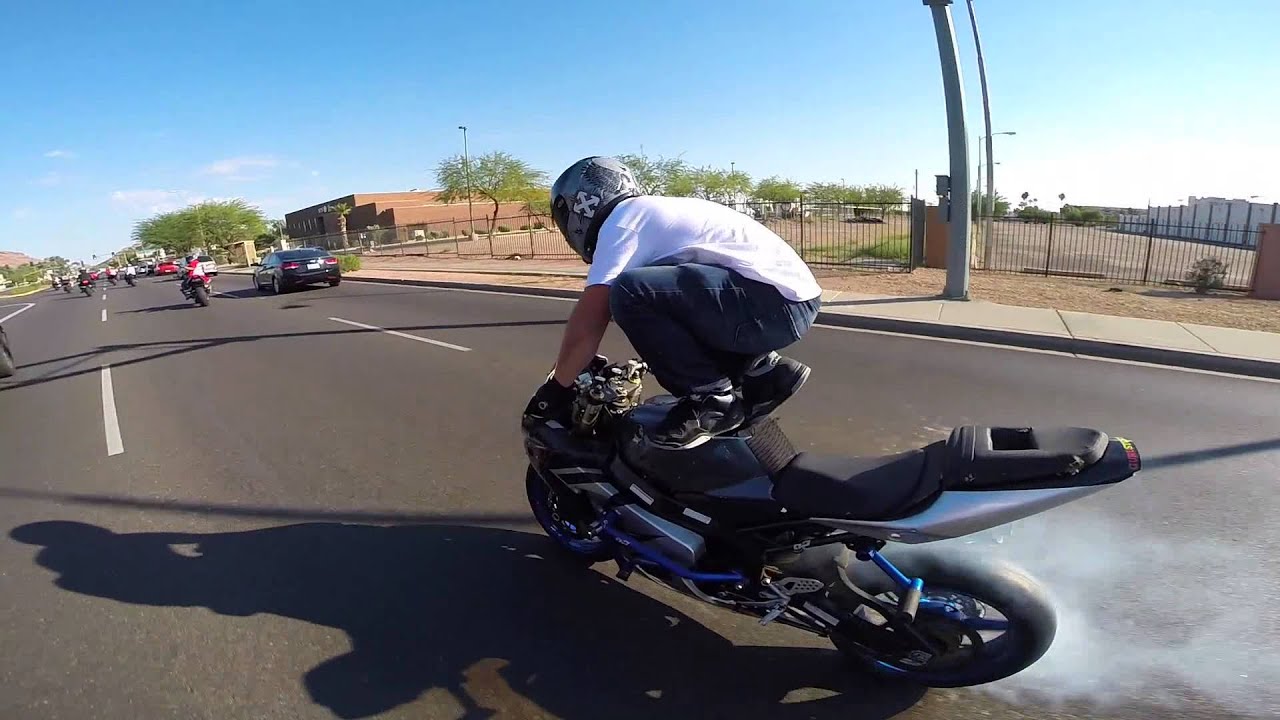 crazy motorcycle burnout in traffic - YouTube