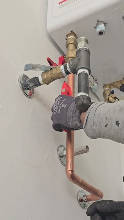Installing a tankless water heater Navien - YouTube