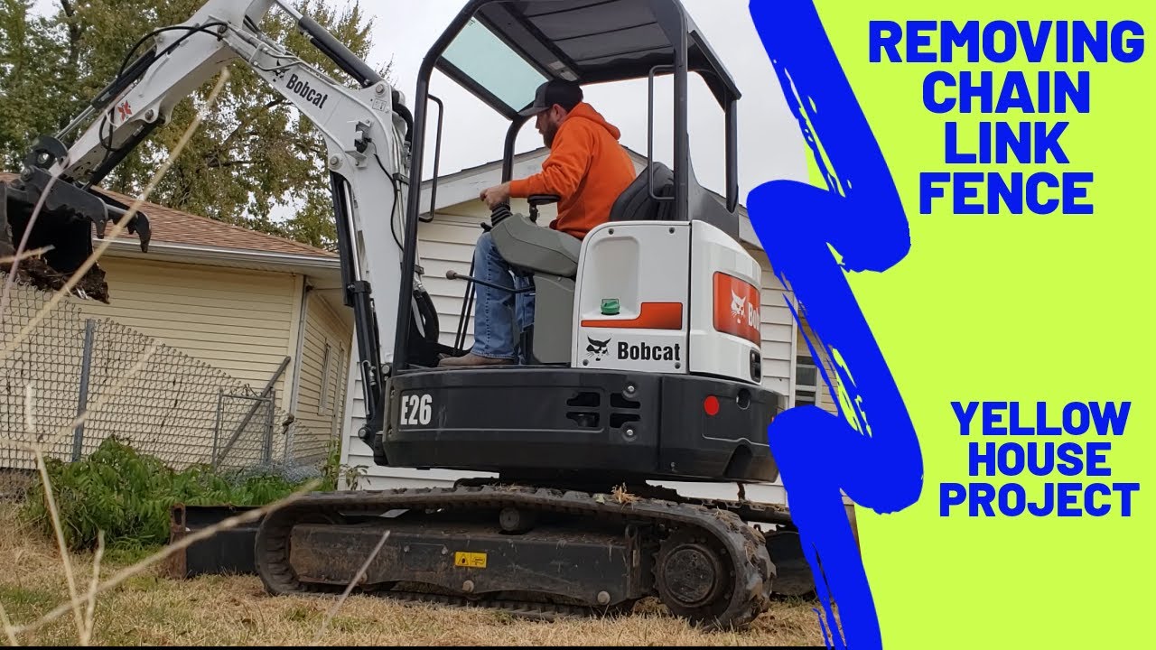 Taking Out A Chain Link Fence & Some Stumps with Bobcat Excavator - YouTube