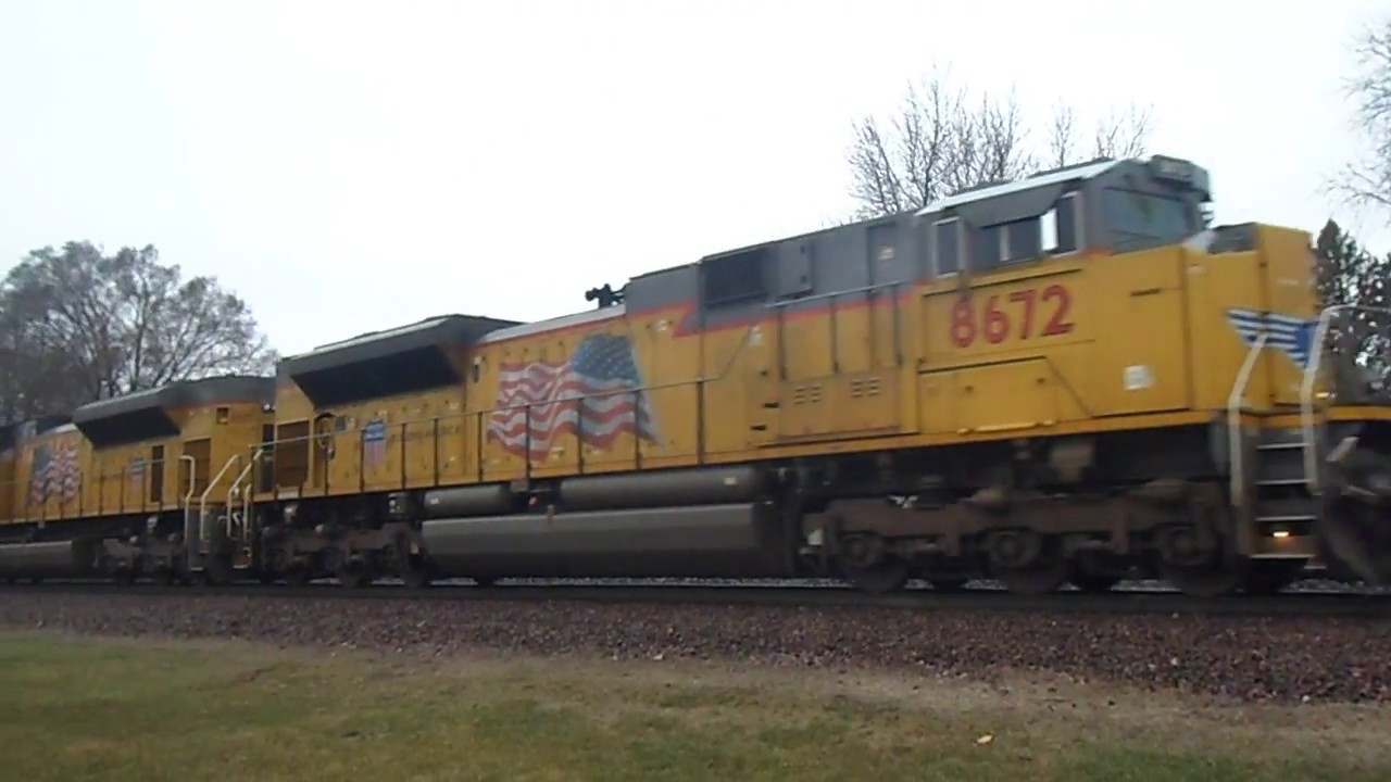 UP 2763 leads SD70 duo on short WB intermodal - YouTube