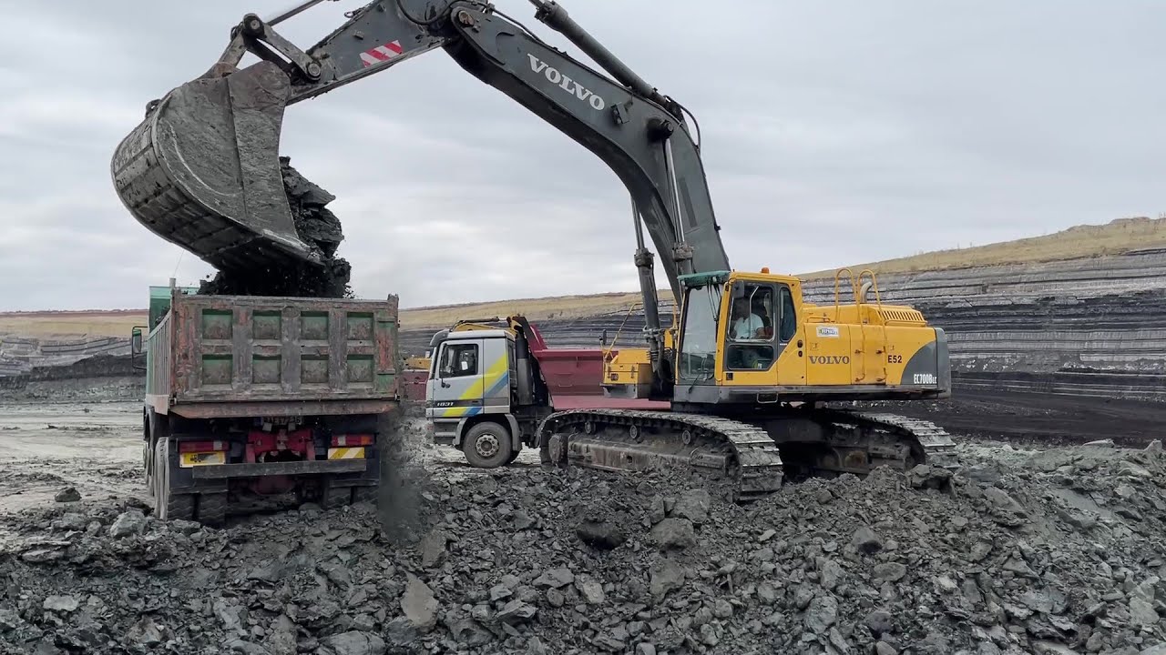 Volvo EC700B Hydraulic Excavator Loading Mercedes & MAN Trucks ...