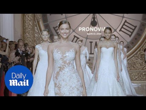 Pronovias show off racy lace wedding dresses on the runway - Daily Mail
