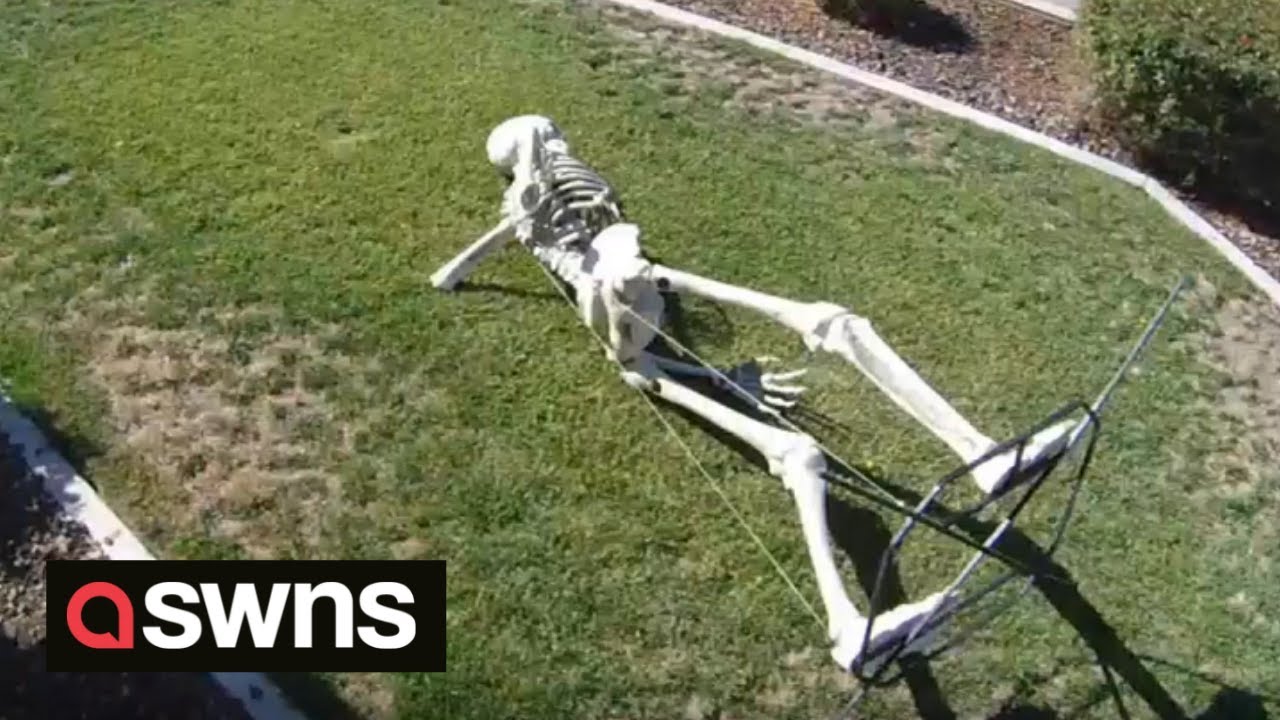 US family decorate house with 12-FOOT SKELETON | SWNS - YouTube