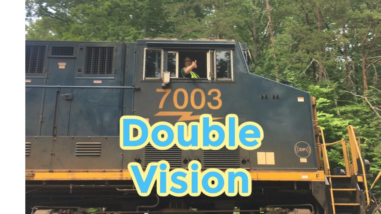 Two CSX M653s pass Moodytown, plus a rainbow colored CSX tank train ...