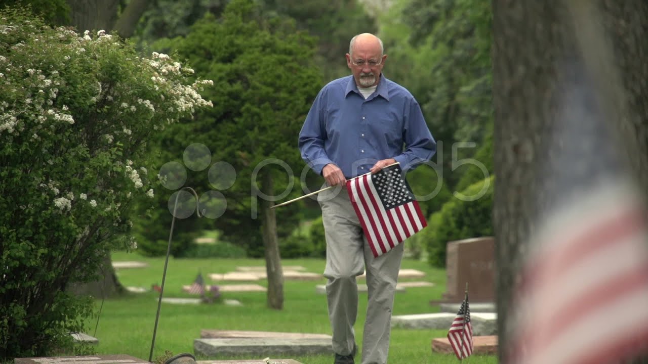 Older Man Walking Through Cemetery Holding Us Flag. Stock Footage - YouTube