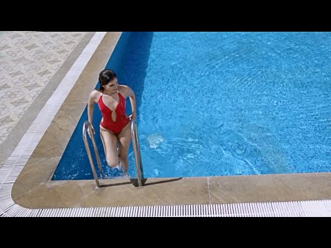 Tanya Hope swimming pool shot in Patel S.I.R  Movie