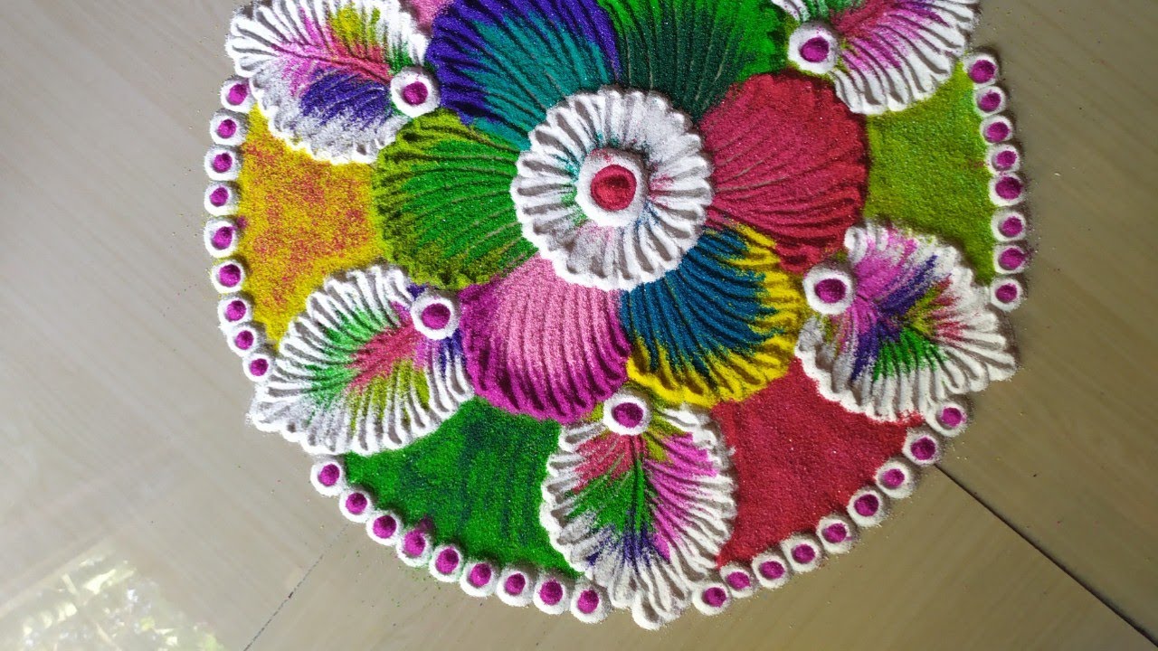 multicolored Rangoli using bangles. - YouTube