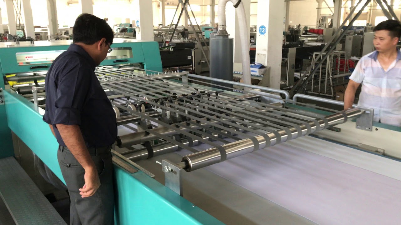 Speedwell 1450 synchro-fly sheeter with 8roll shaftless unwind stands ...