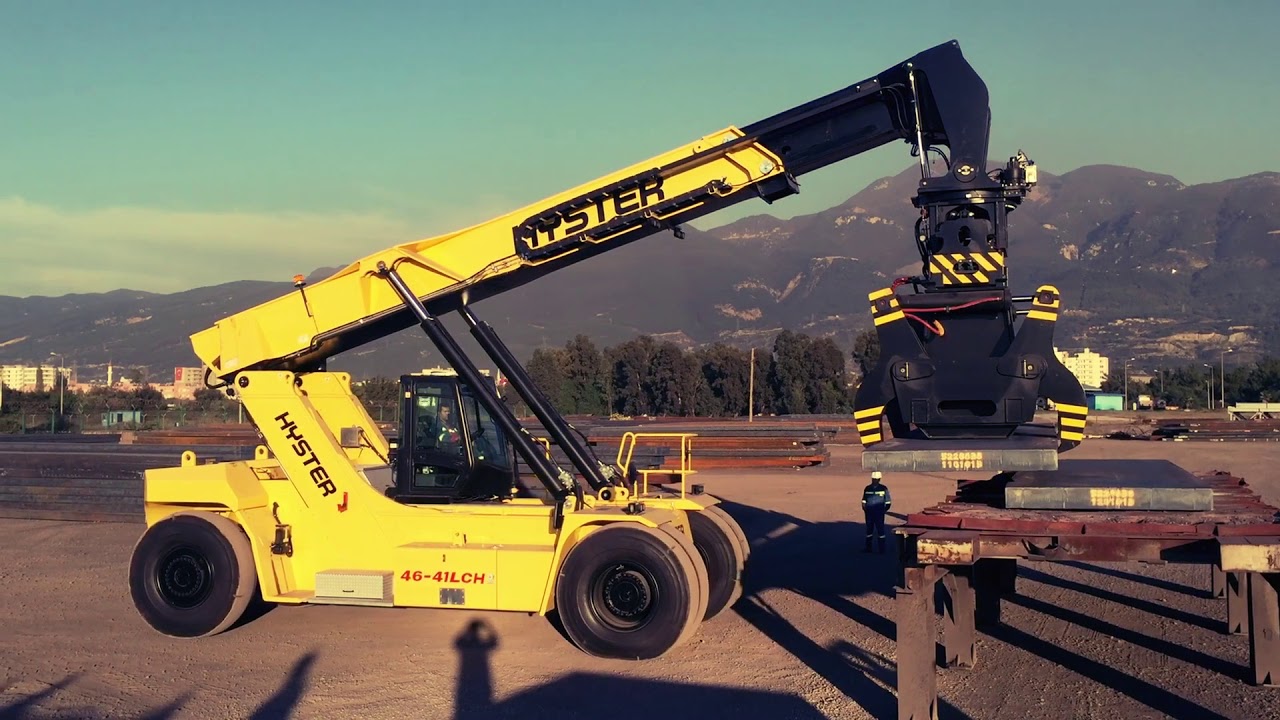 Steel slab handling slab handler on Hyster Reach Stacker - YouTube