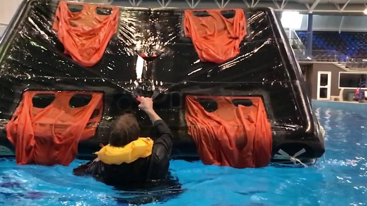 Life Raft Righting Technique - YouTube