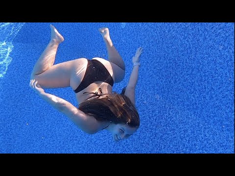 Swimming Underwater in Black Bikini