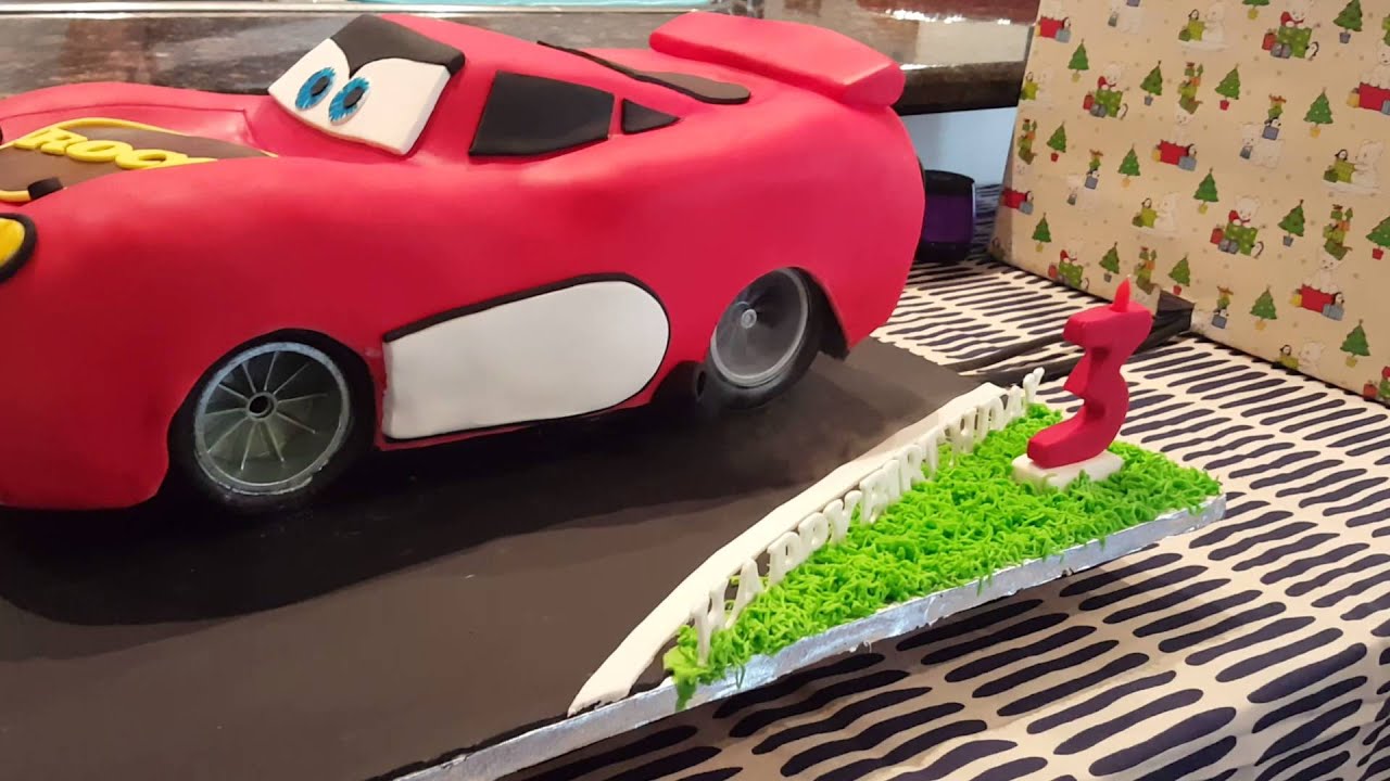 Awesome car cake doing a burnout with smoke, sound and spinning wheels ...