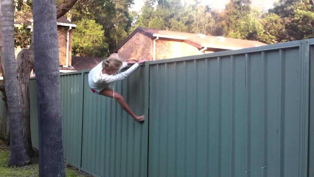 Hannah trying to climb a fence (fail) - YouTube