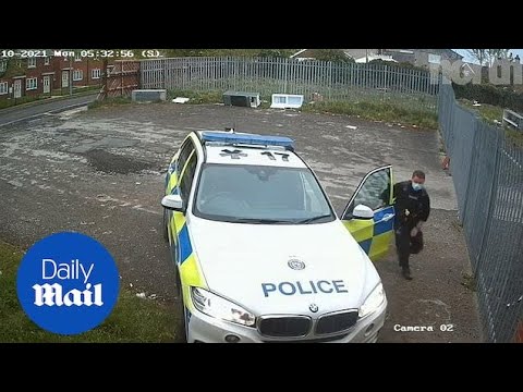Policeman caught urinating in public on home security camera - YouTube