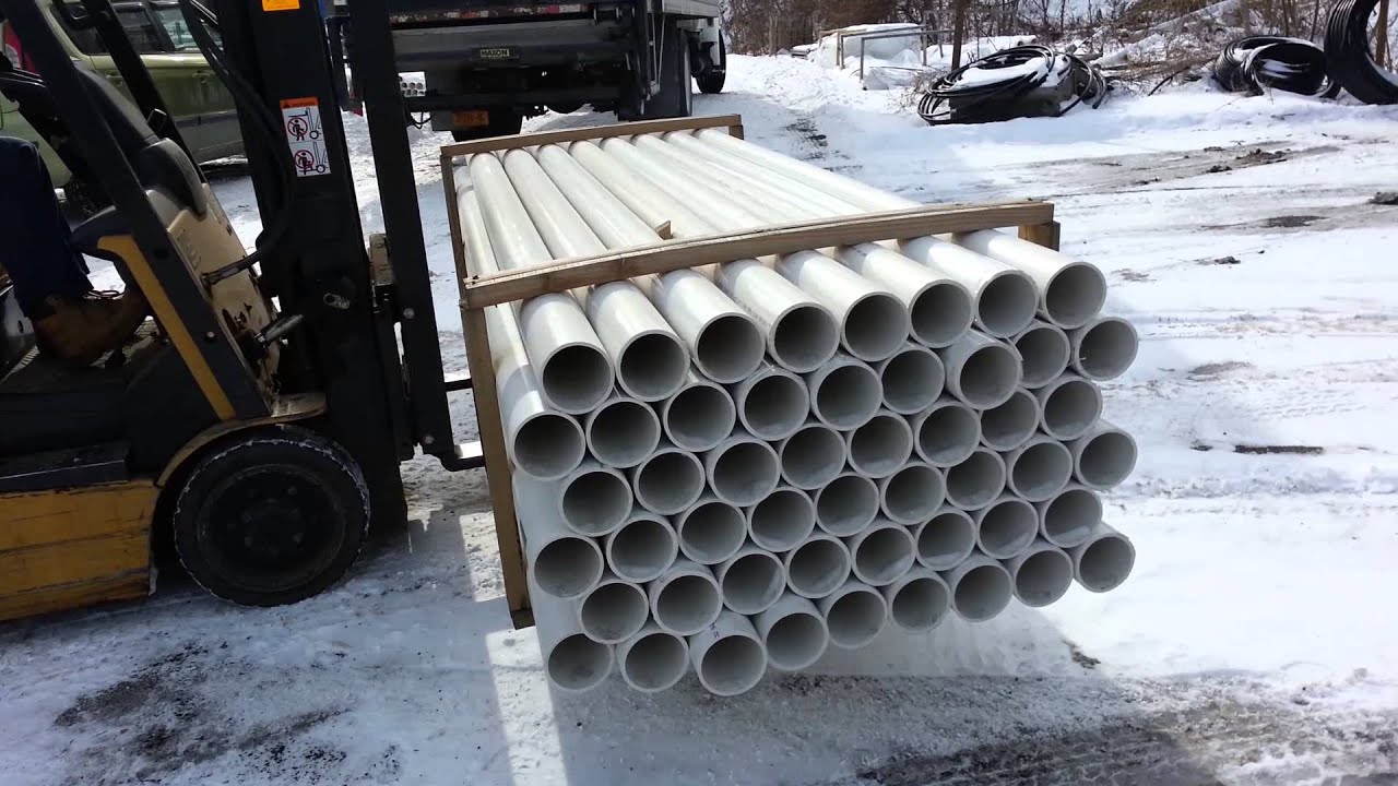 Unloading pipe as forklift gets stuck - YouTube