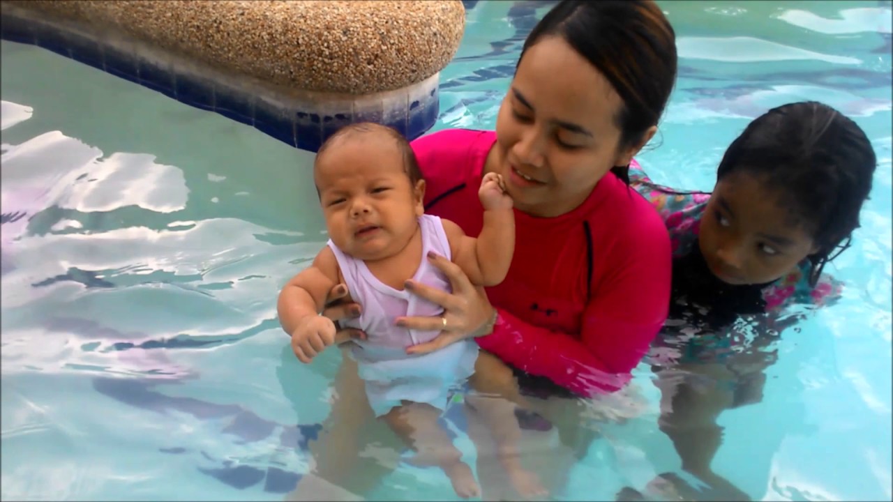 Baby JD's first bath in the pool - YouTube