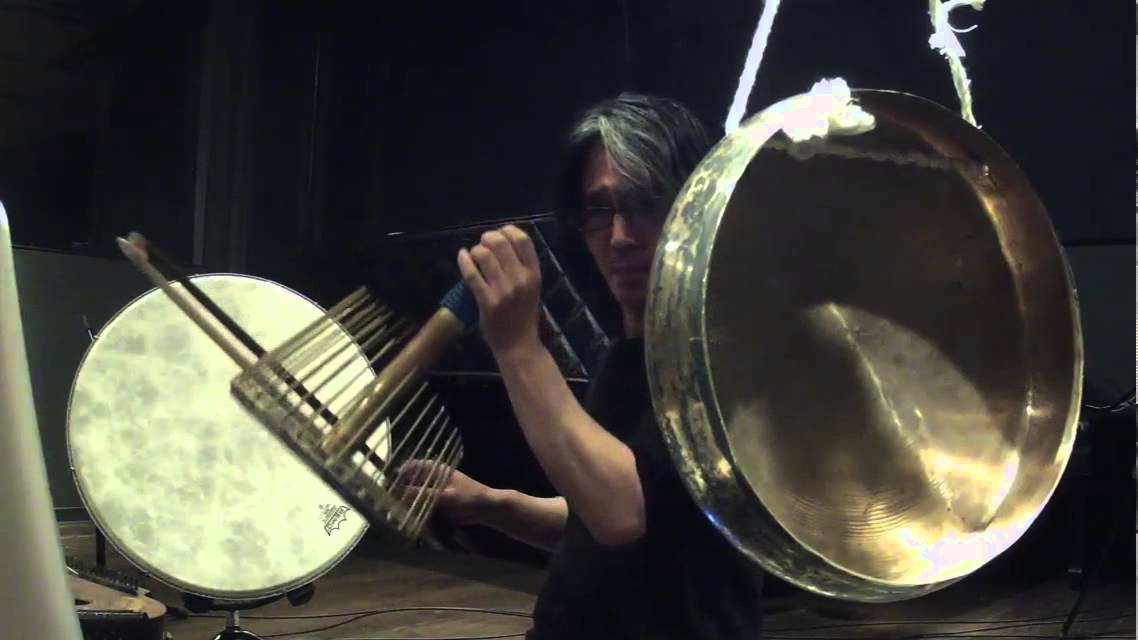Satoshi Takeishi in performance - YouTube