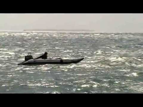 Inflatable catamaran in rough seas - YouTube