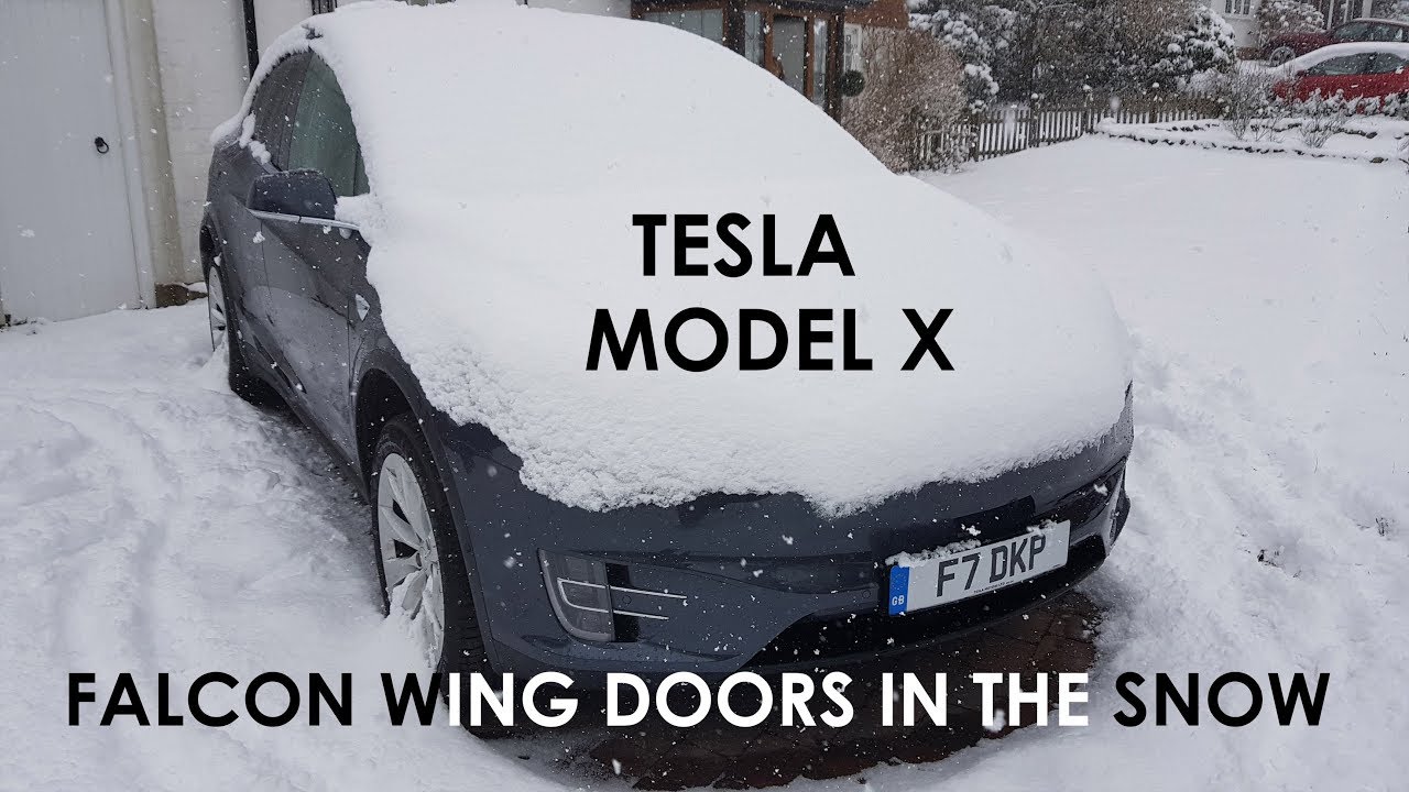 Model X - Falcon Wing Doors in the Snow - YouTube