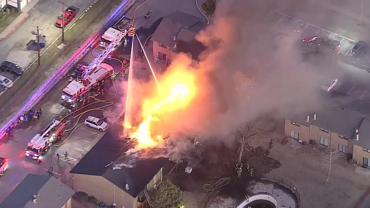 Several people displaced after massive fire destroys apartment in ...