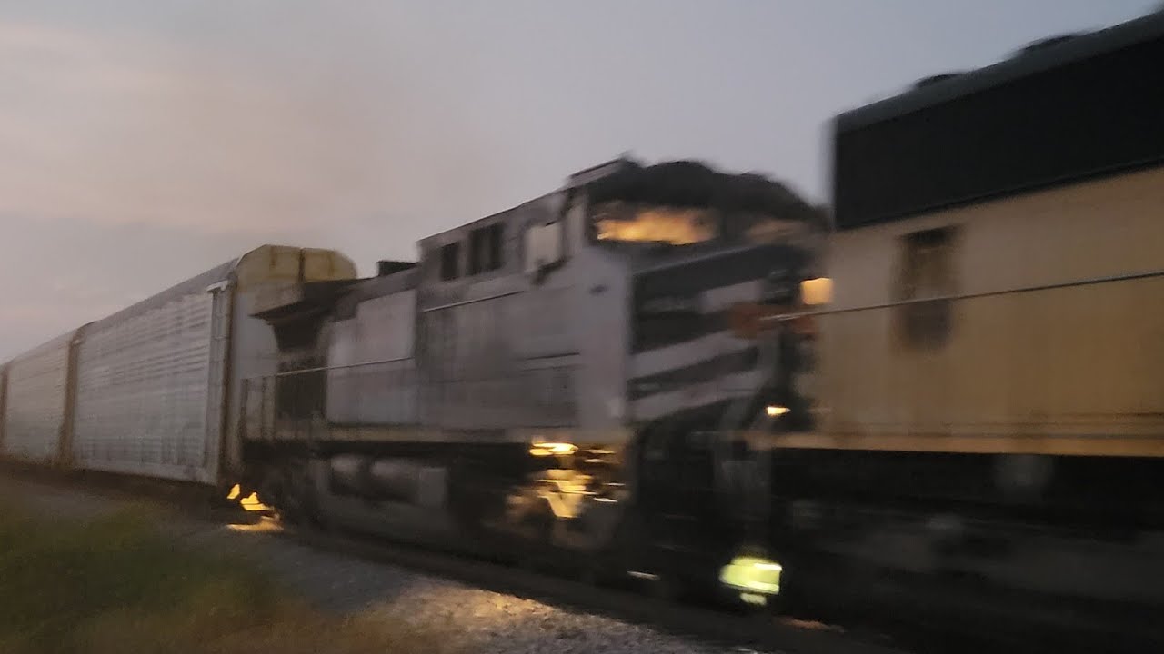 Union Pacific 4532 leads a northbound auto train out of Taylor Texas ...