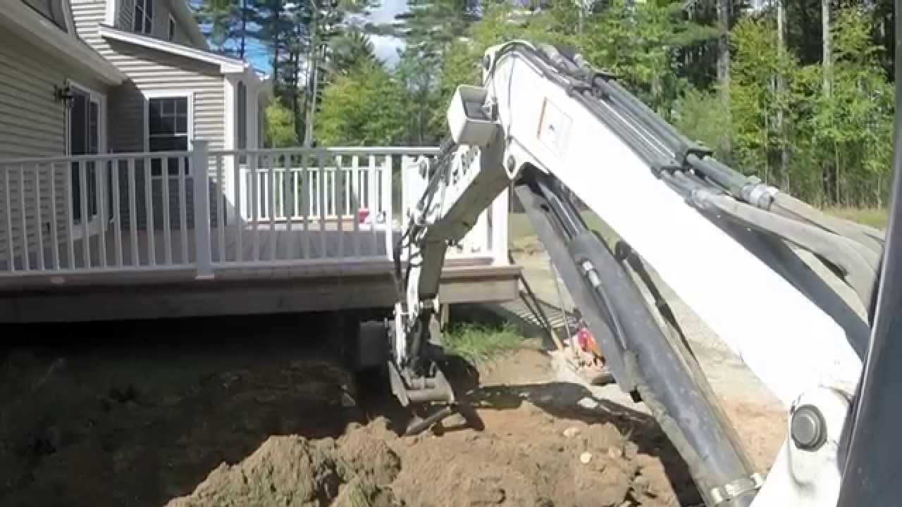 Bobcat 430 Mini Excavator Digging Near Deck - YouTube