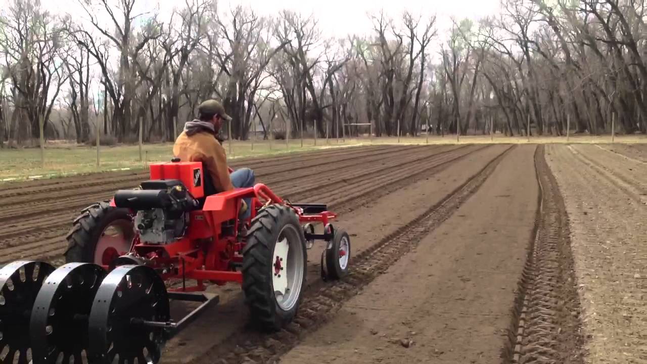 Tuff-Bilt tractor and row marker - YouTube