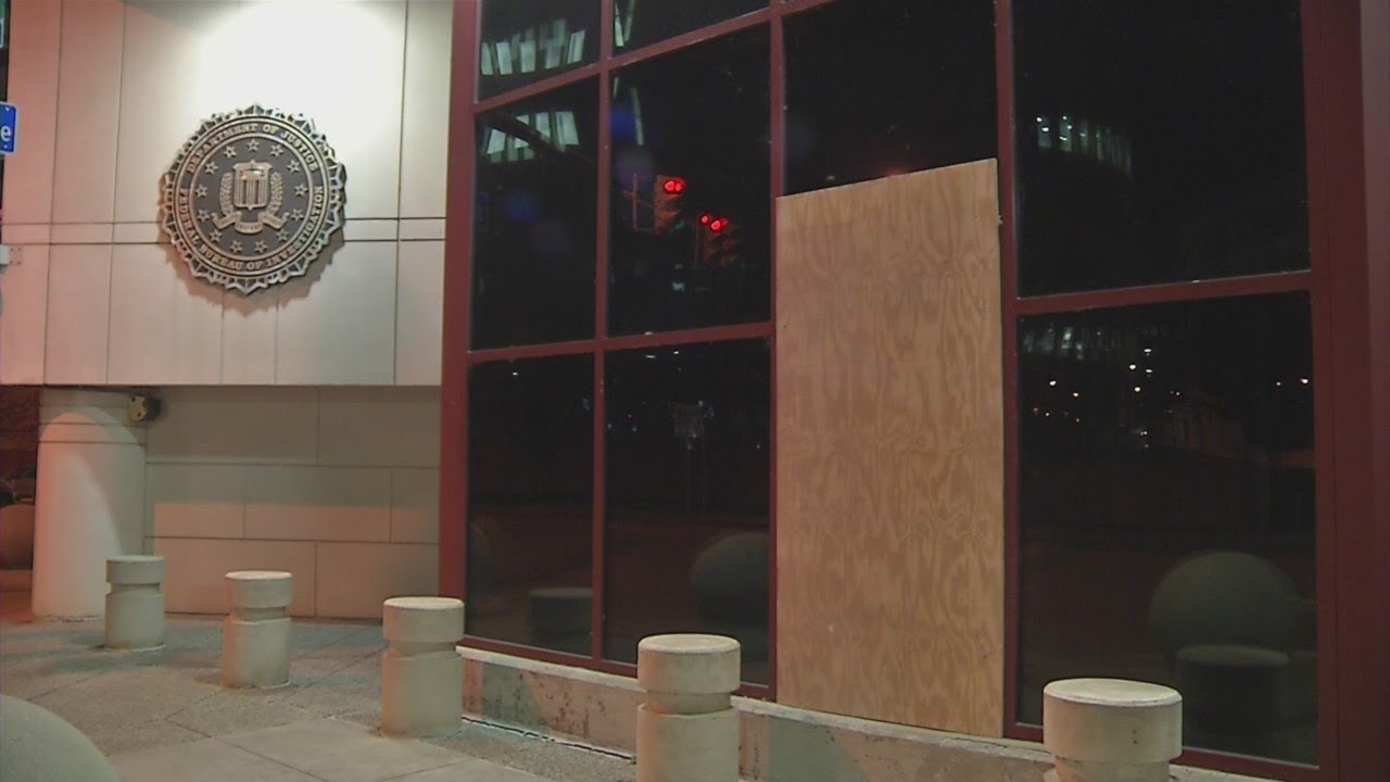 Person throws brick at Buffalo FBI office, detained - YouTube