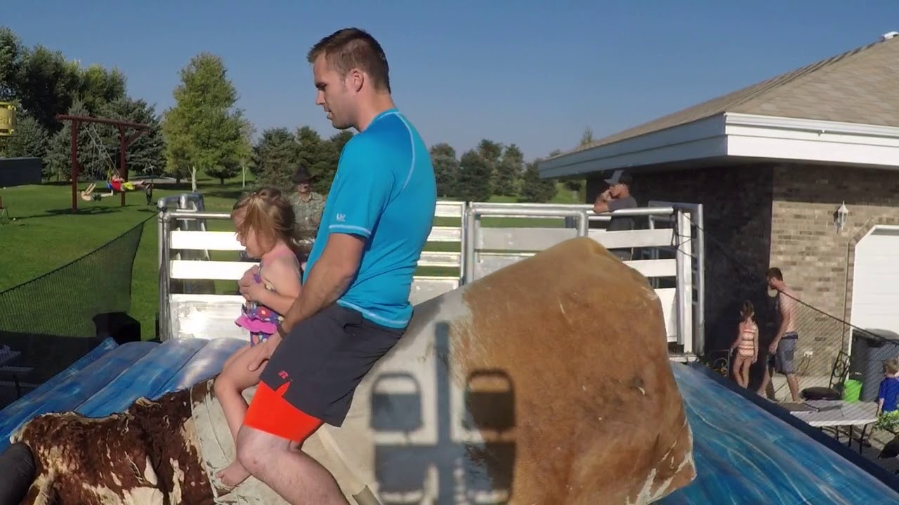 Dan and munchkin on the mechanical Super Bull in Raft River - YouTube