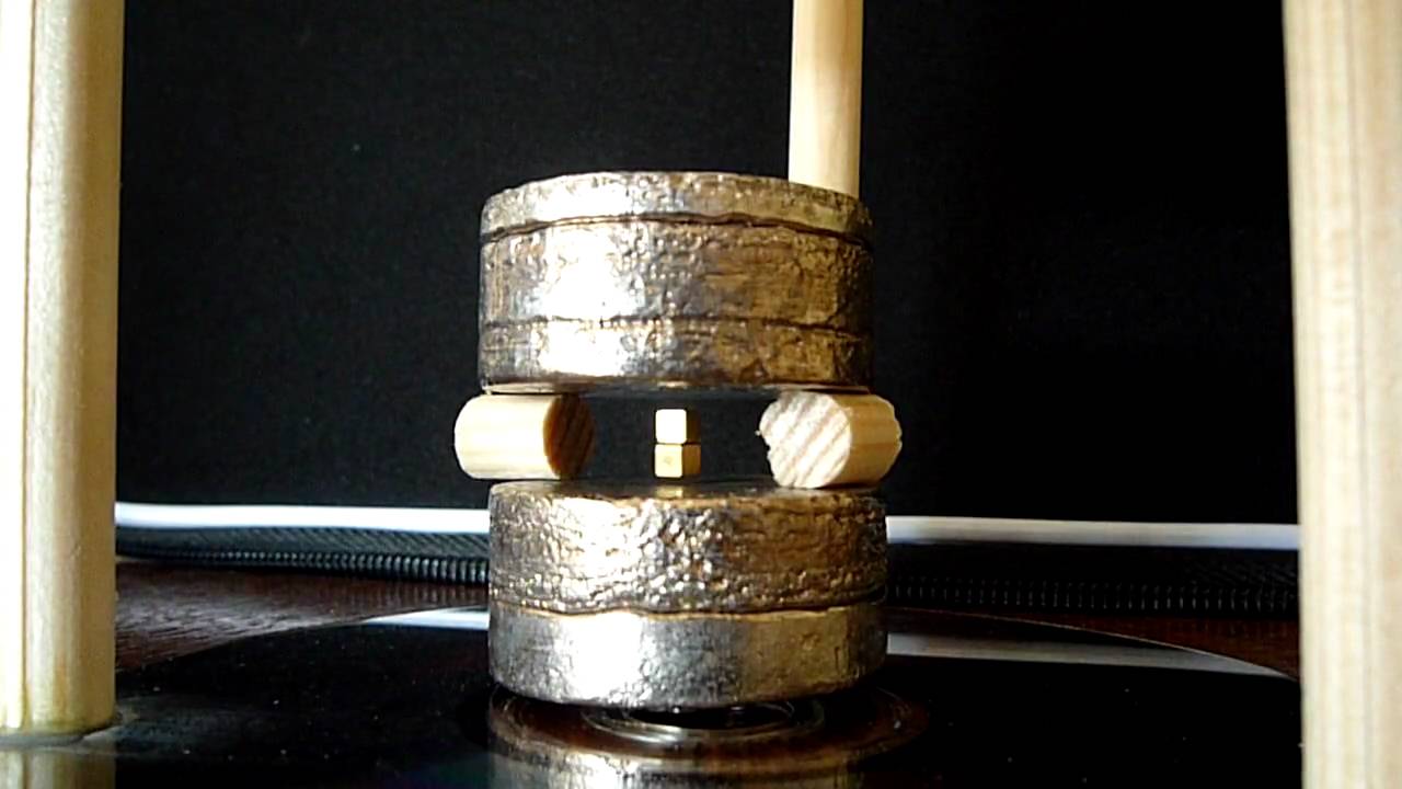 Spinning levitating cube magnets with bismuth - YouTube