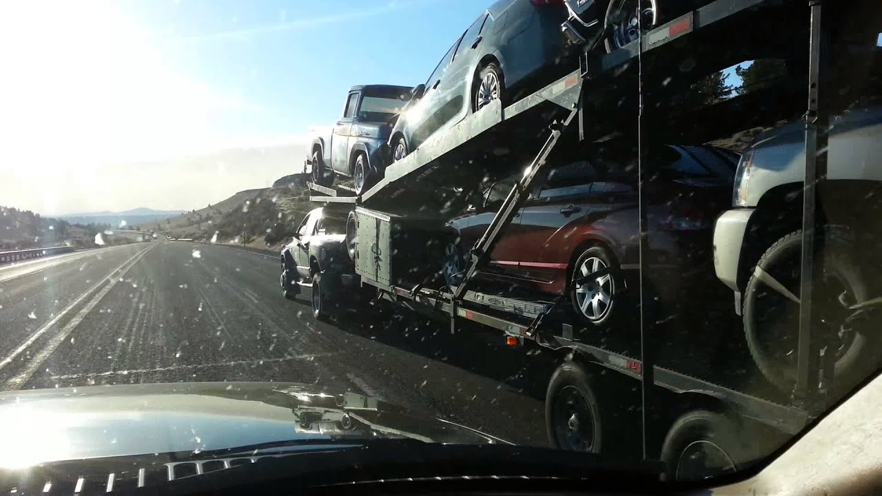 Cummins Ram pulling 3 cars + 2 trucks - YouTube