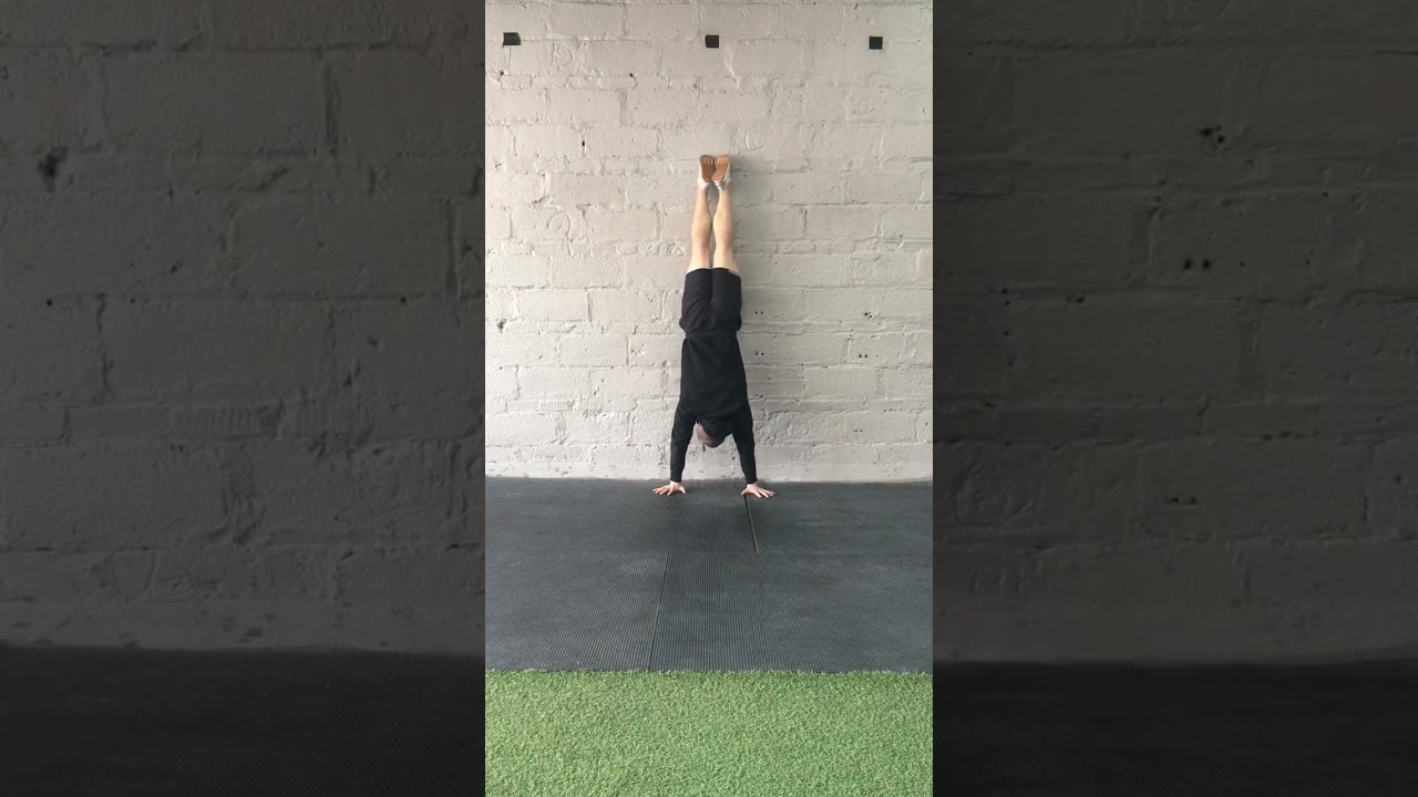 Handstand Shoulder Taps [chest facing wall] - YouTube
