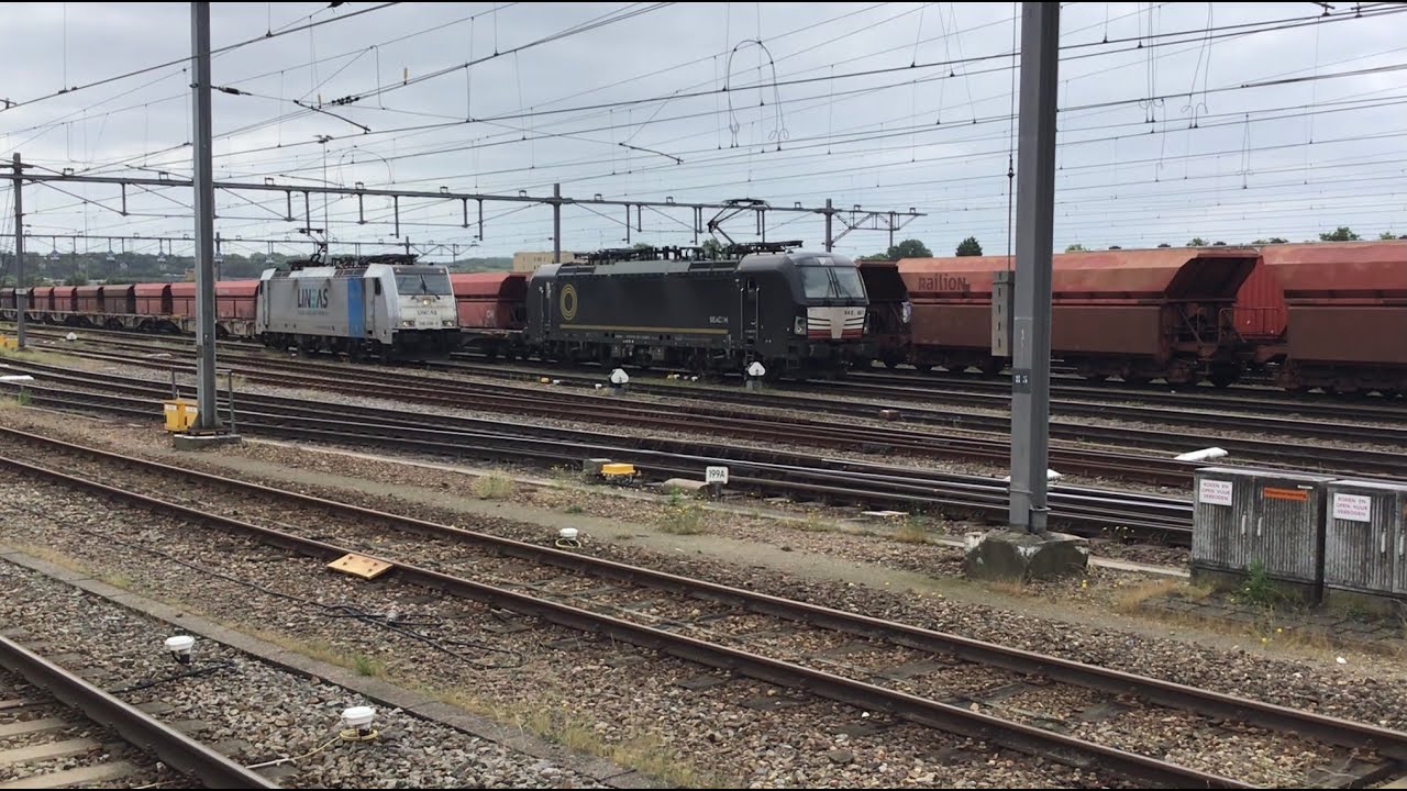 Beacon Rail Vectron locomotive with empty Container Train at Venlo the ...