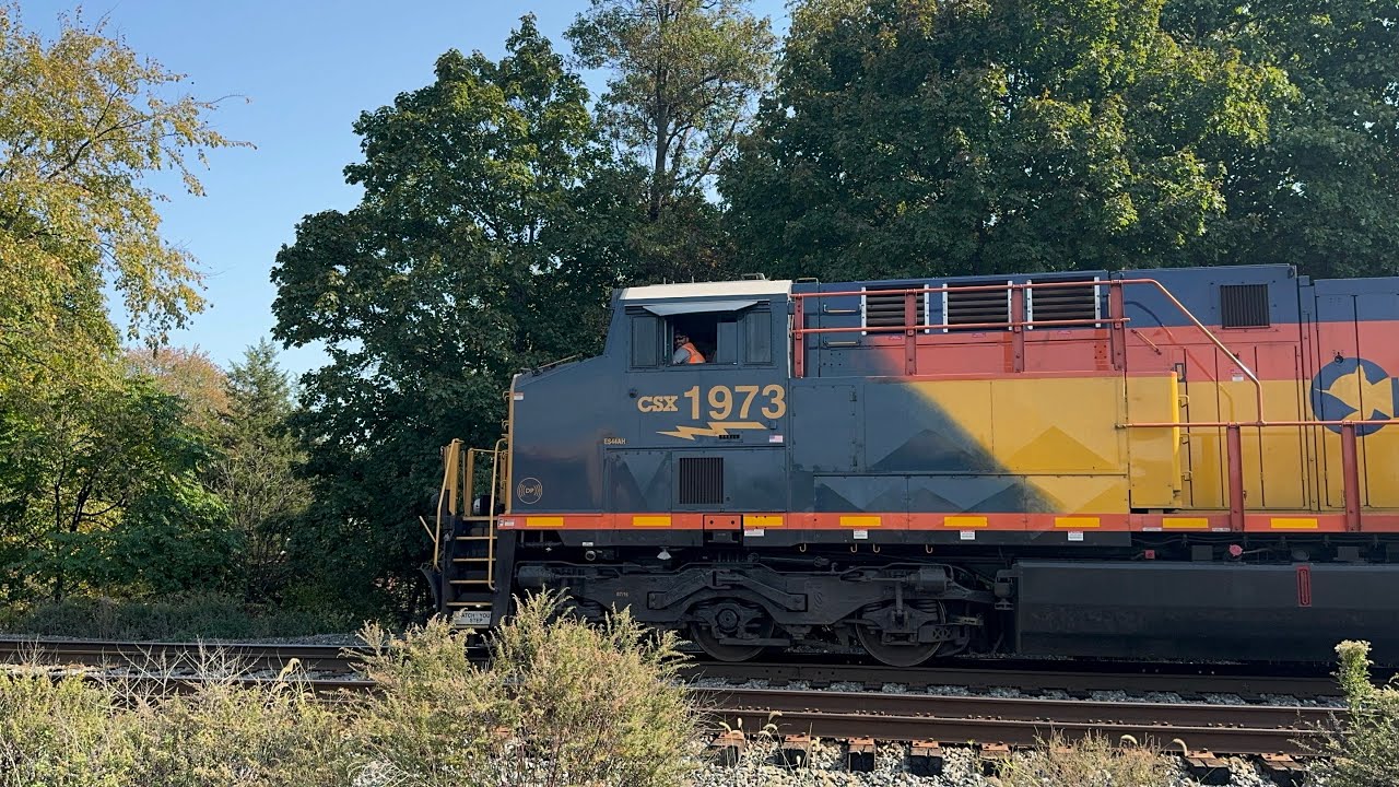CSX 1973 Chessie System heritage unit leads CSX M410 through Manville ...