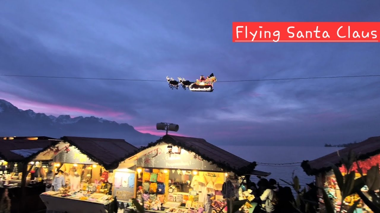 The flying Santa Claus of Montreux on his way into the sunset of the ...