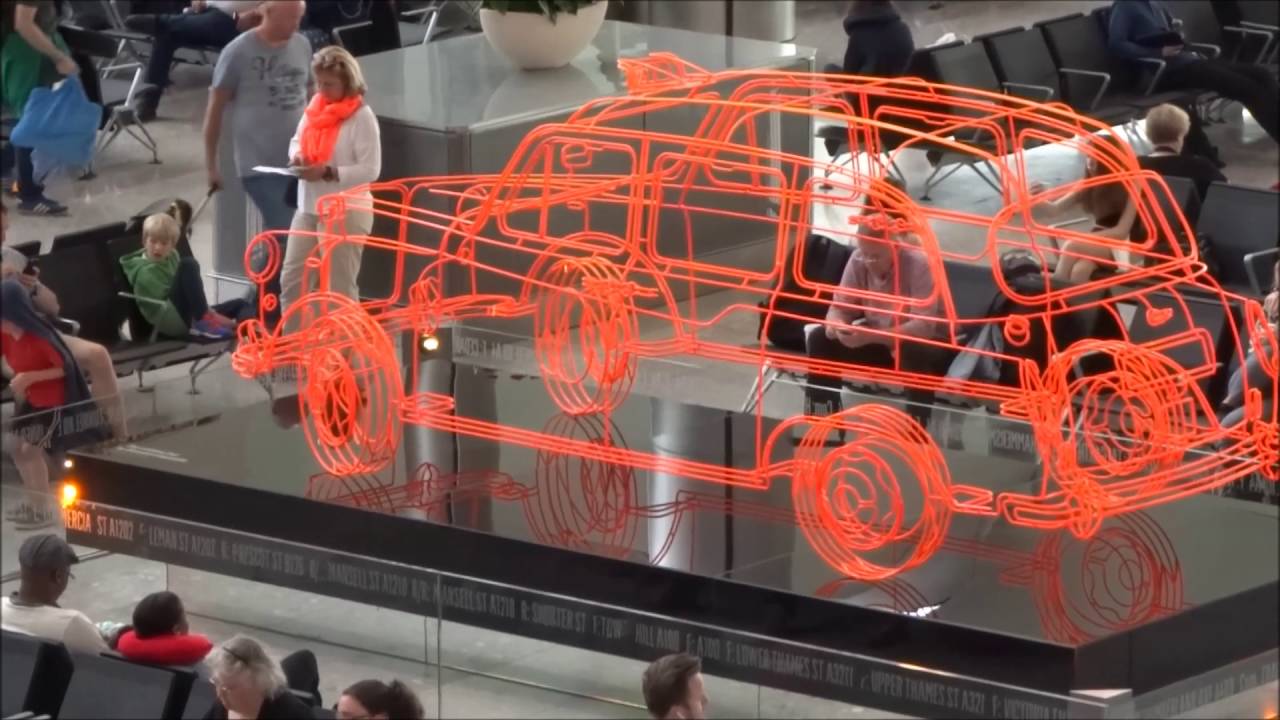 Inside London Heathrow Airport Terminal 2 depatures lounge with duty ...