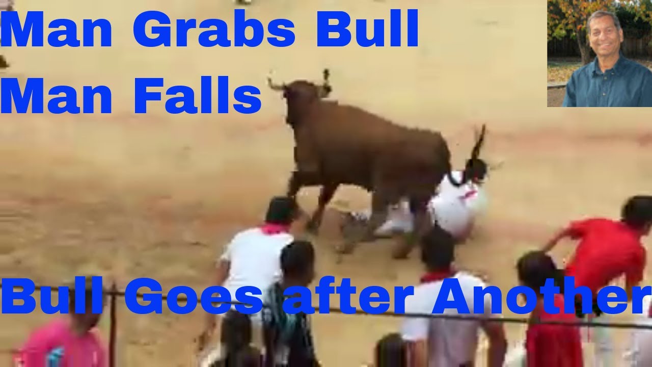 Man Grabs Bull, Goes Under, Gets up:) Running of Bulls, San Fermin ...