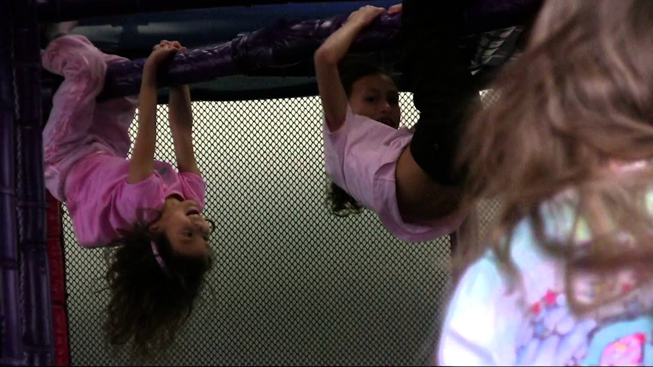 Julia and Anna hanging upside down at Burger King 03/15/2010 - YouTube