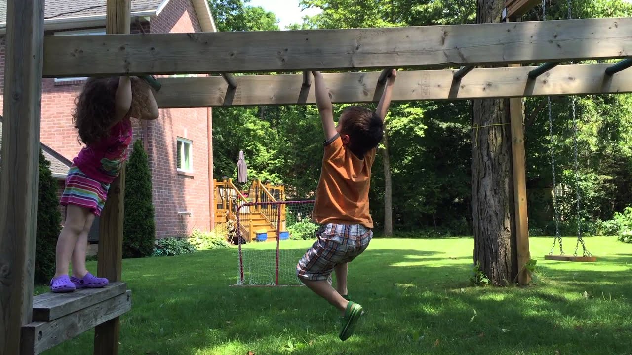 Little boys first time doing monkey bars - YouTube