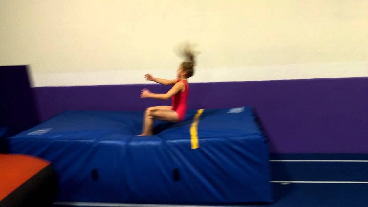 Front handspring front tuck onto mat for height - YouTube