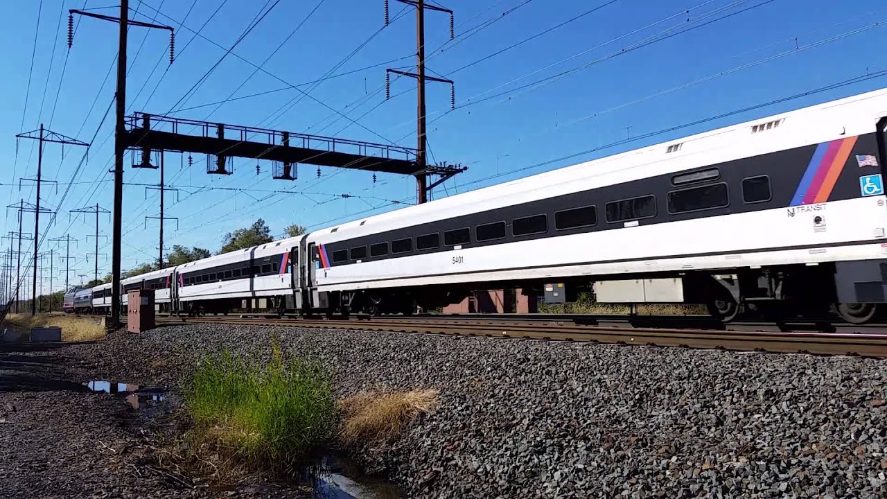 NJ Transit Test Train with Amtrak Cafe car - Edison Station - YouTube