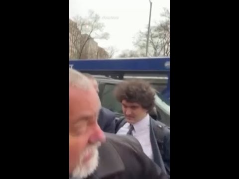 Dramatic scenes as Ex-FTX CEO Bankman-Fried arrives at court to enter plea