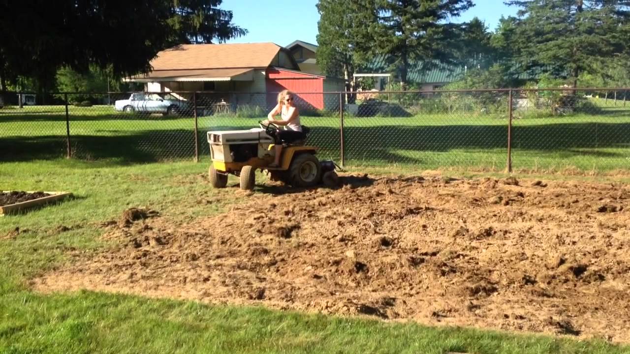 Cub Cadet 149 Discing a new garden - YouTube