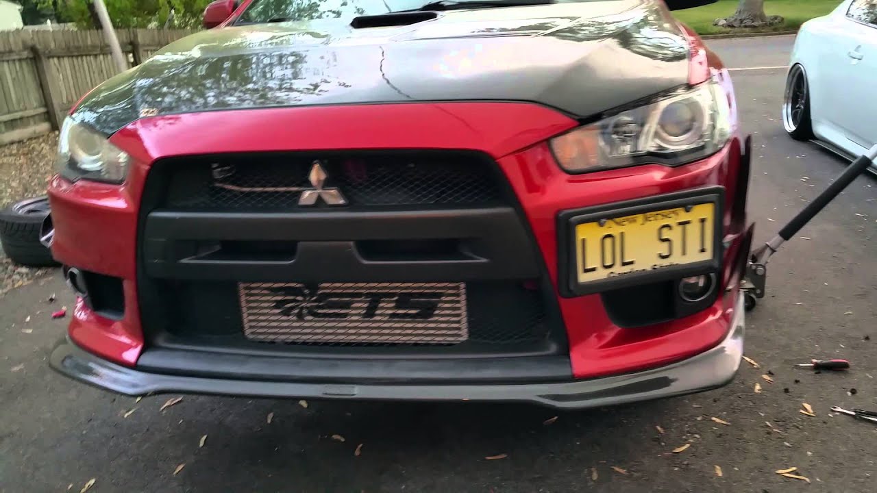 Carbon canards installed on evo x - YouTube