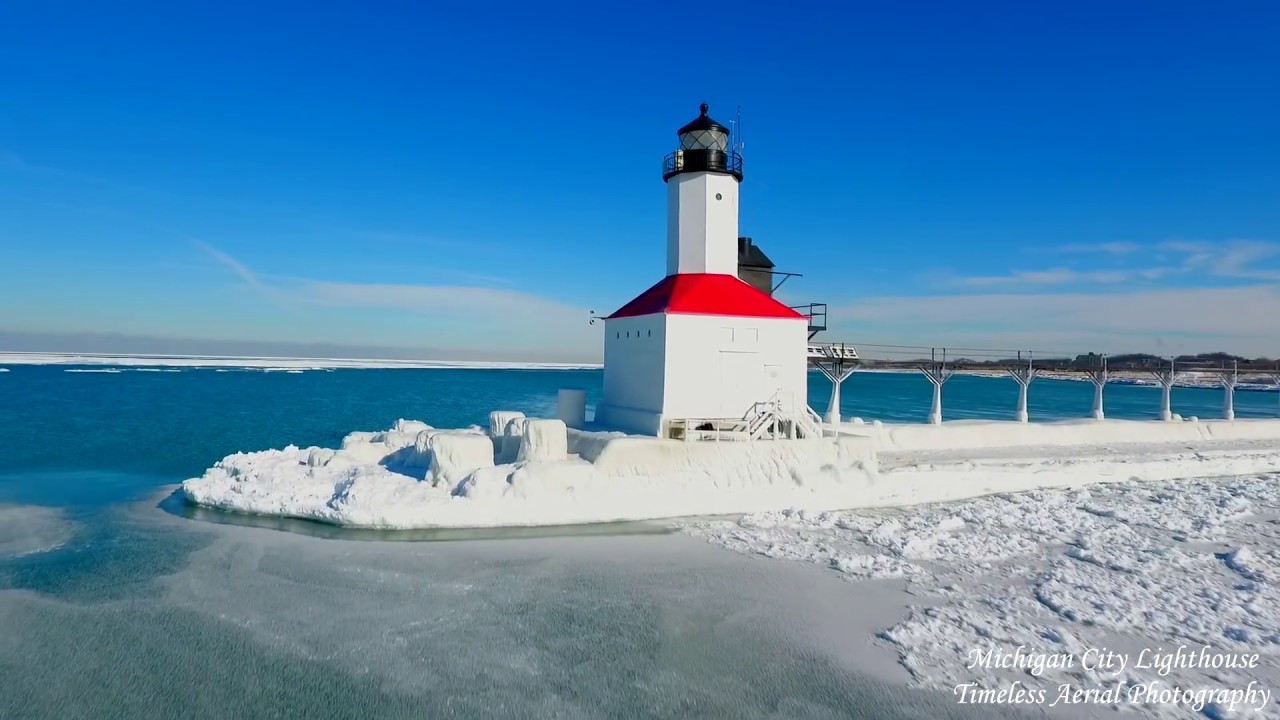 Frozen Lighthouse and Lake Michigan Aerial Tour. - YouTube