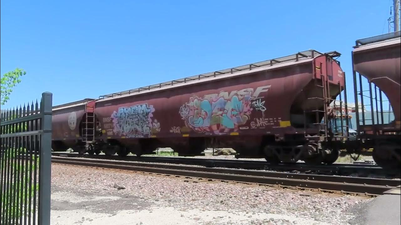 BNSF 6533 leads a WB grain train at Loula St in Olathe, KS - YouTube