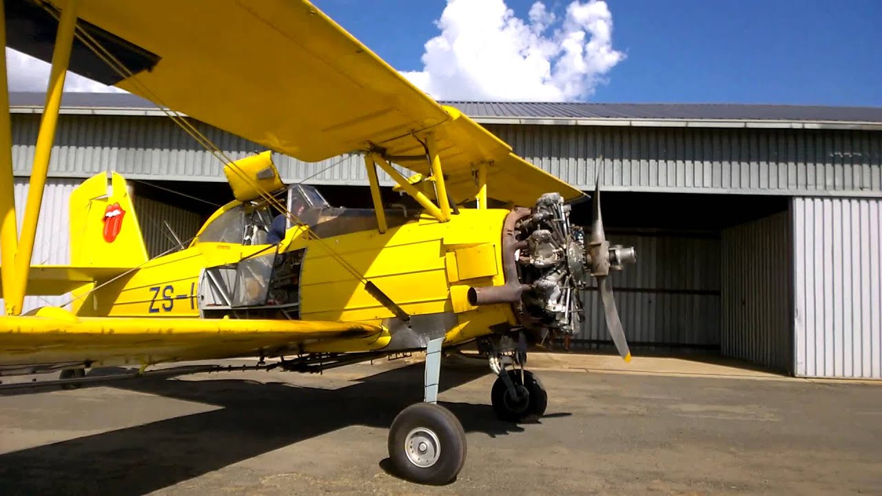 Biplane crop duster hand start up after 1 year in the shed - YouTube