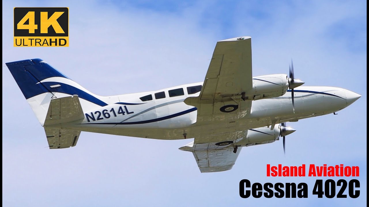Cessna 402C (N2614L) Runway 07 Arrival / Runway 25 Departure from St ...
